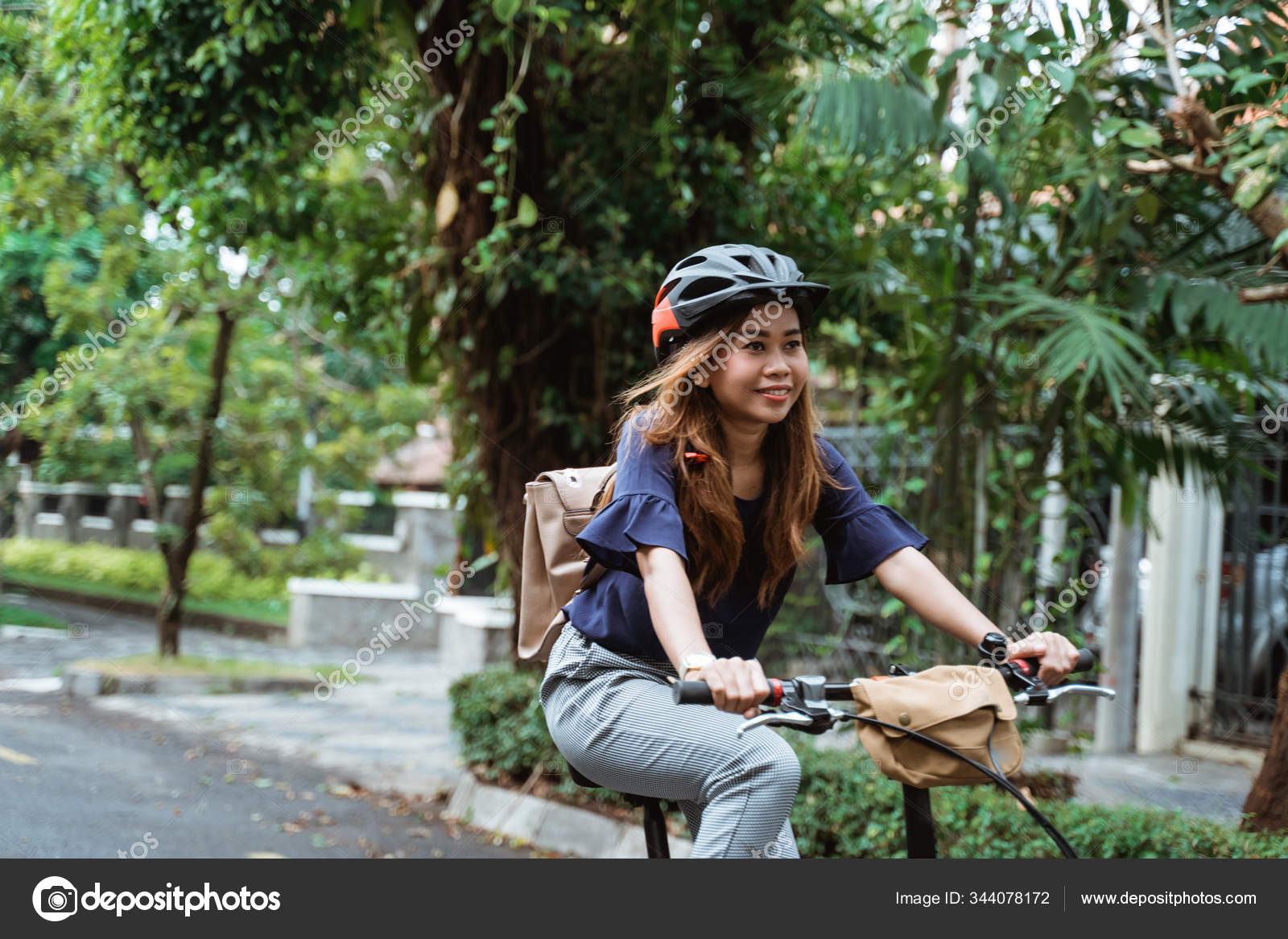 Young women riding folding bikes on the road — Stock Photo © odua ...