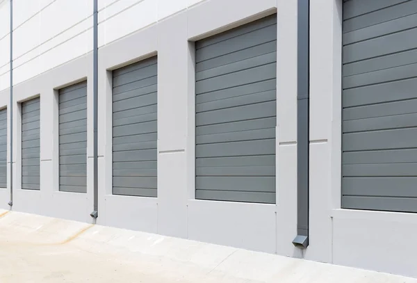 New construction warehouse loading dock white walls gray metal s ...