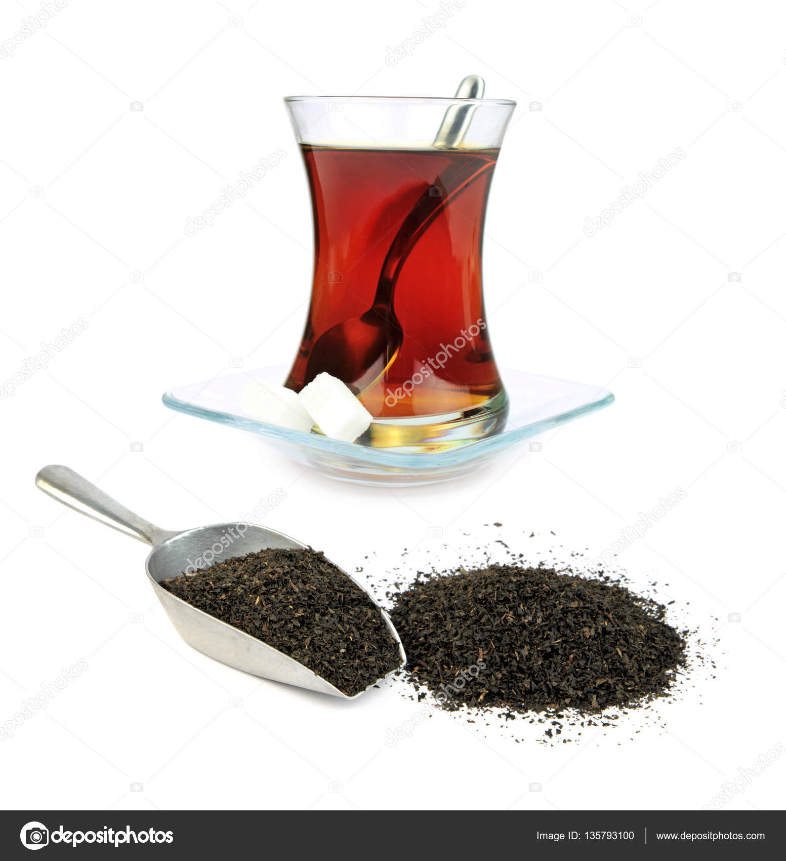 Turkish tea in traditional glass and dry black tea leaves . Stock Photo ...