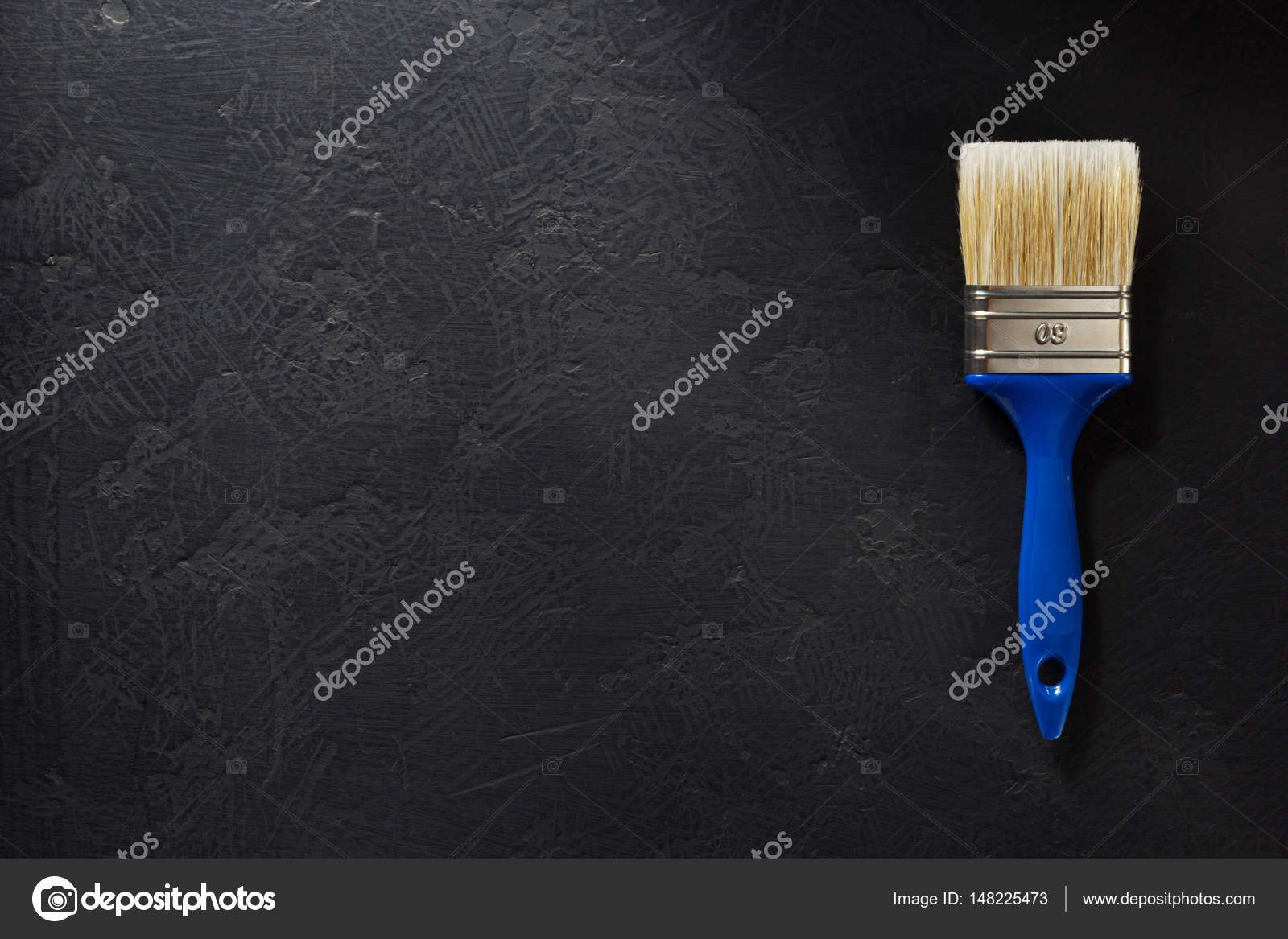 Paintbrush tool at black background Stock Photo by ©seregam 148225473