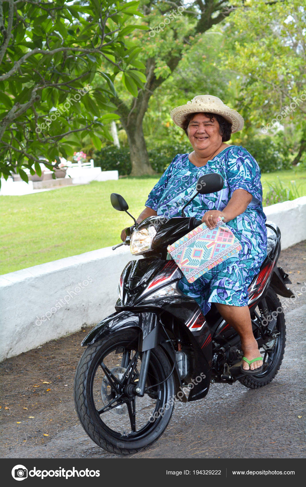Happy old age Pacific Islander woman rides a scooter Stock Photo by ...
