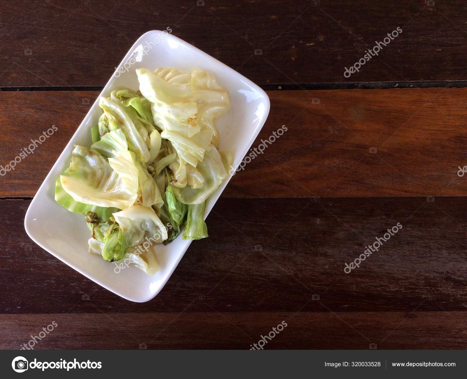 Stir Fried Cabbage White Plate — Stock Photo © Thattep #320033528