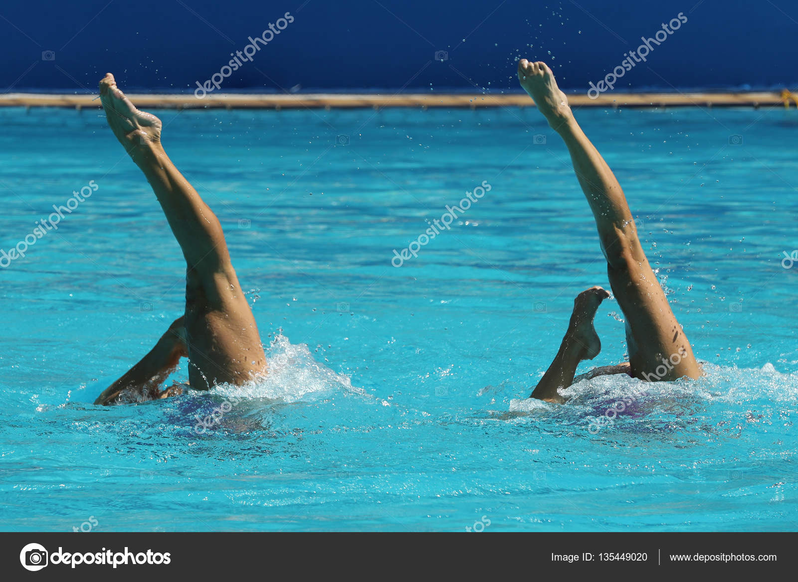Synchronized swimming duet during competition — Stock Photo © zhukovsky ...
