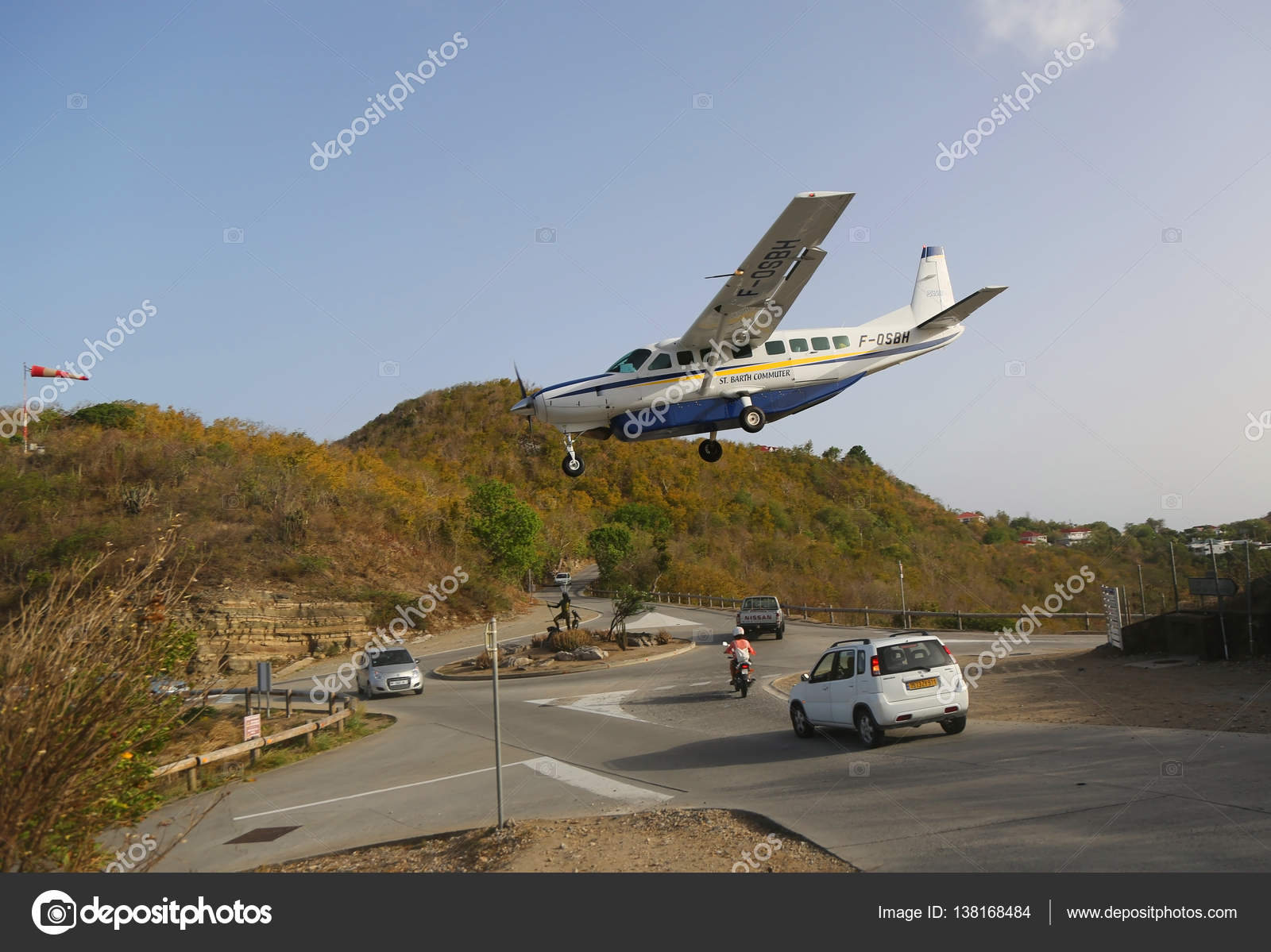 Dramatic St. Barth Commuter plane landing at St Barts airport. – Stock ...