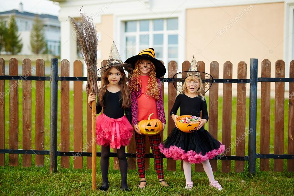 Three witches in Halloween Stock Photo by ©pressmaster 125881984