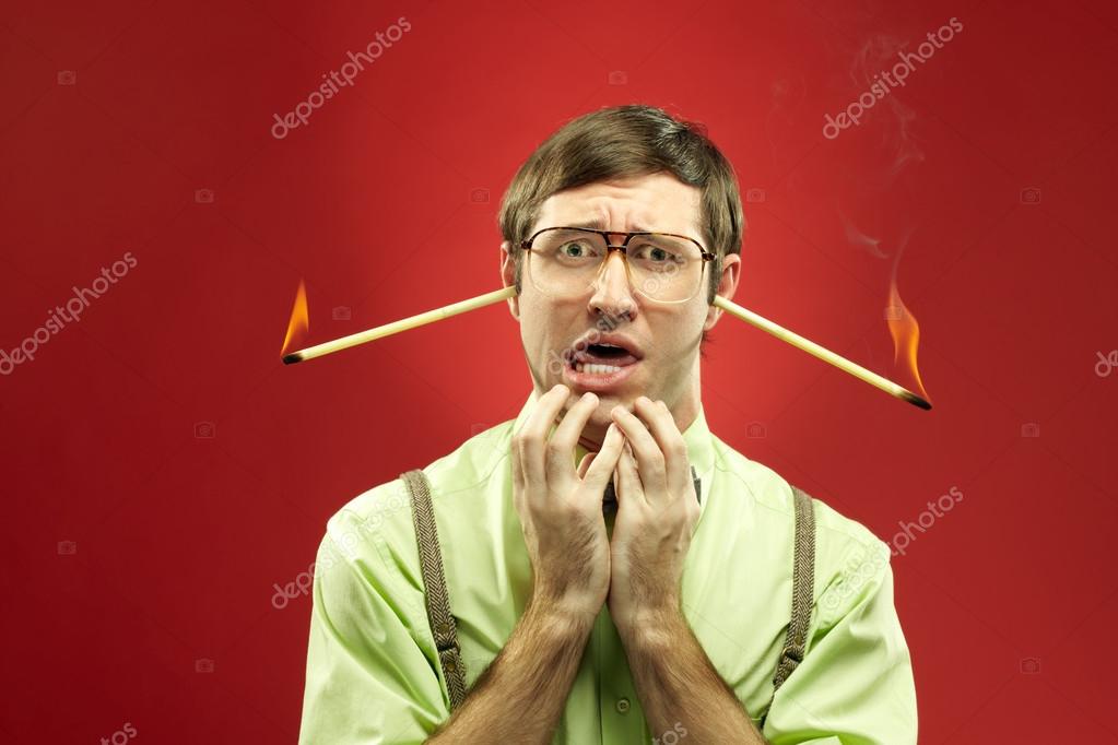 Typical nerd with burning sticks in his ears Stock Photo by ...