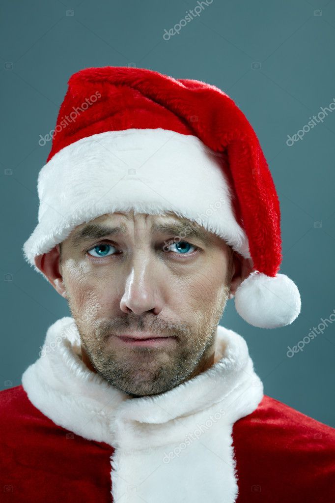 Upset Santa knitting his brows — Stock Photo © pressmaster #126760214