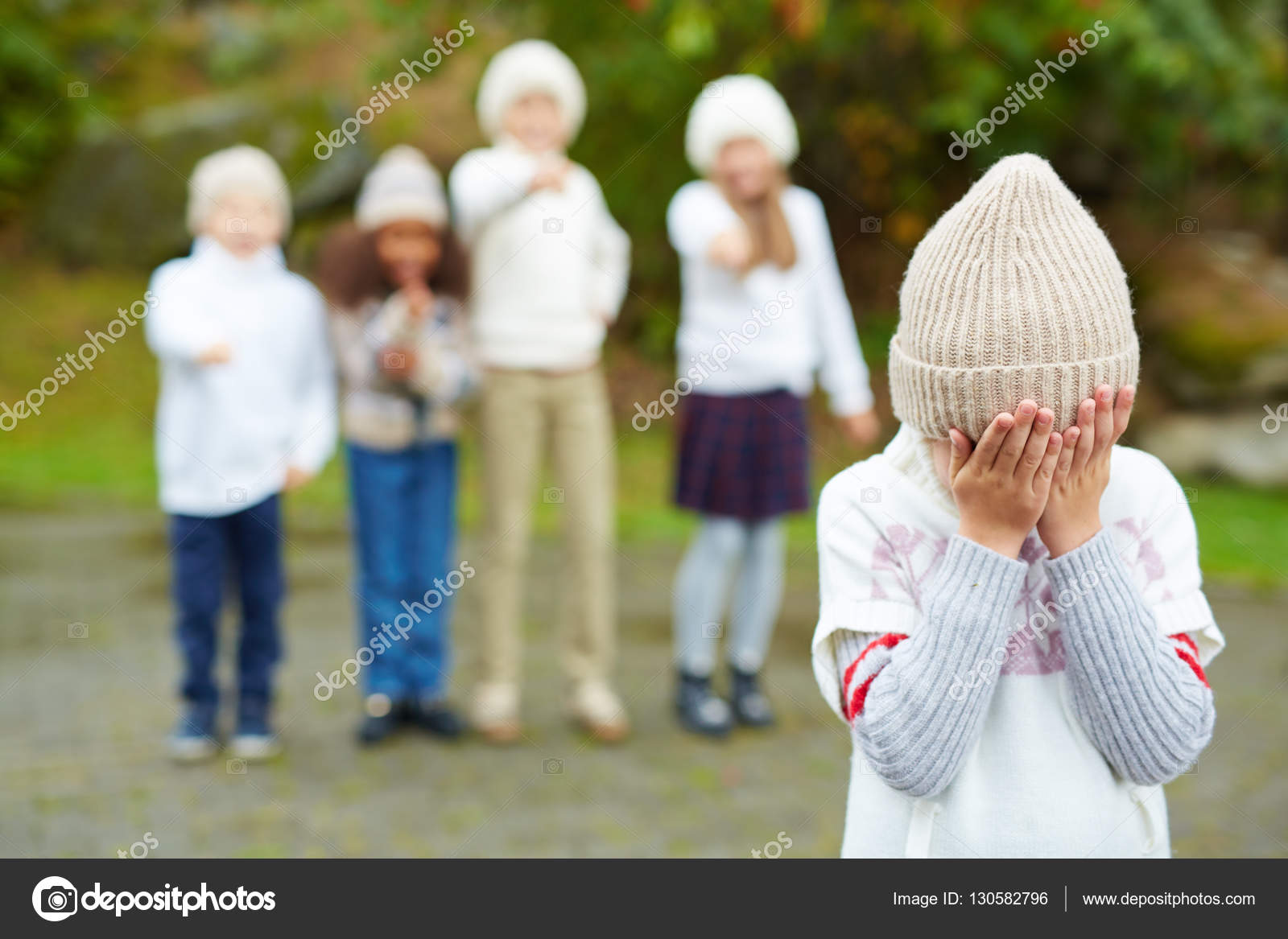 Boy crying because of bullying children — Stock Photo © pressmaster ...