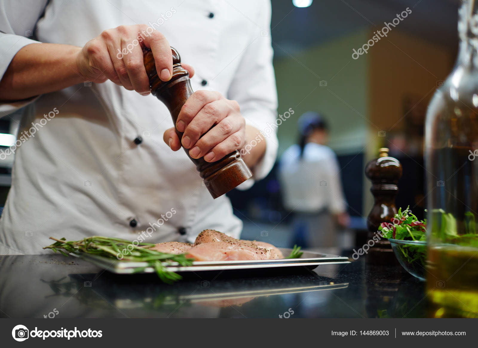 Man seasoning lean meat — Stock Photo © pressmaster #144869003