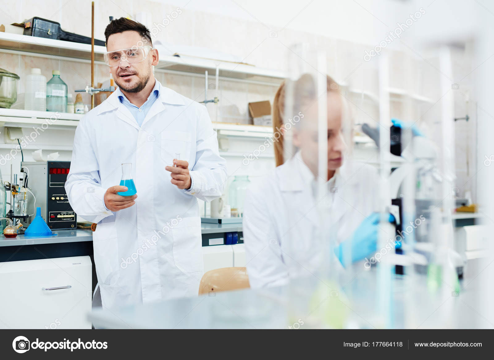 Portrait Two Scientists Man Woman Working Test Tubes Modern Laboratory ...