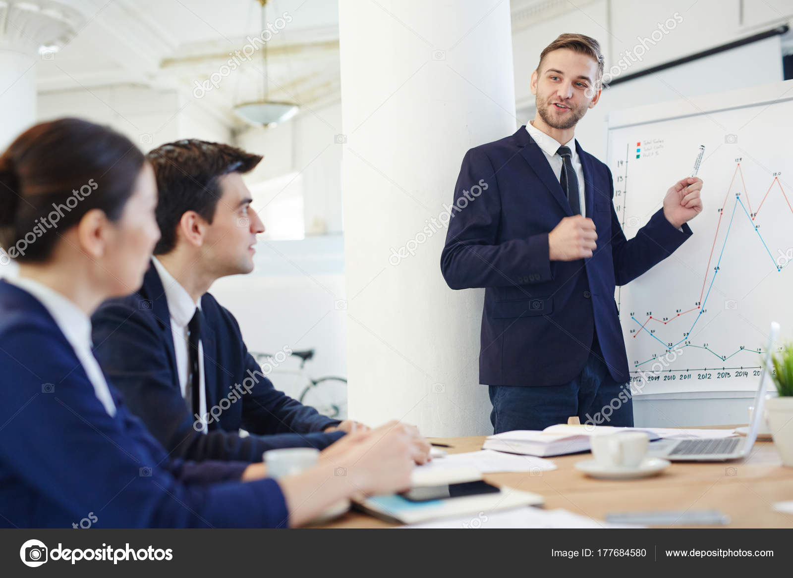 Young Confident Man Pointing Whiteboard While Explaining Graph — Stock ...