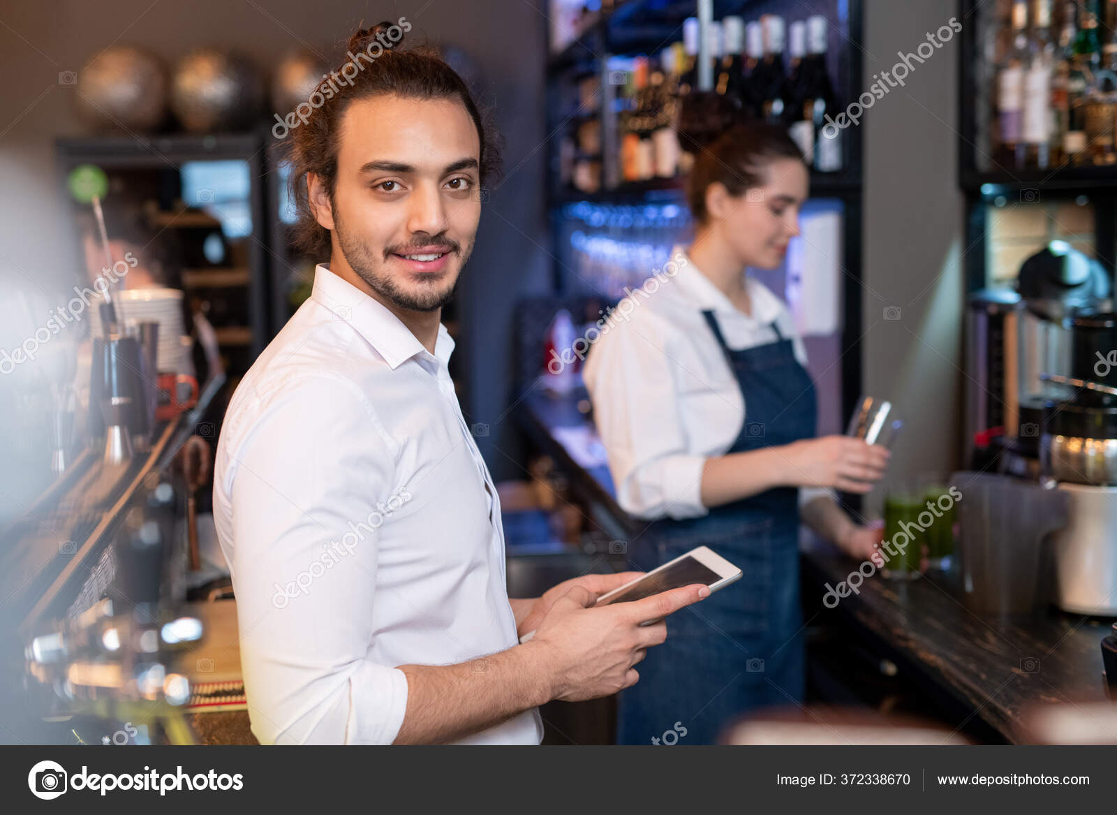 Young Friendly Waiter White Shirt Scrolling Online Menu While Checking ...