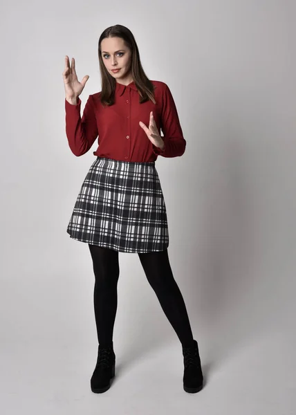 Full Length Portrait Brunette Girl Wearing Red Long Leather Jack Stock