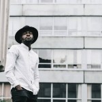 Young handsome afro black man Stock Photo by ©peus 90303780