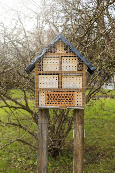 Wooden insect house decorative bug hotel. - Stock Image - Everypixel