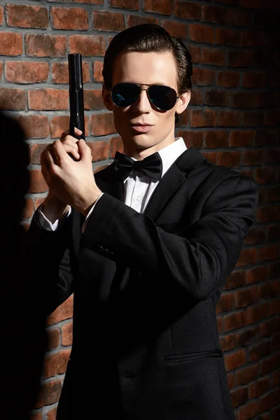 Handsome guy with gun Pictures, Handsome guy with gun Stock Photos ...