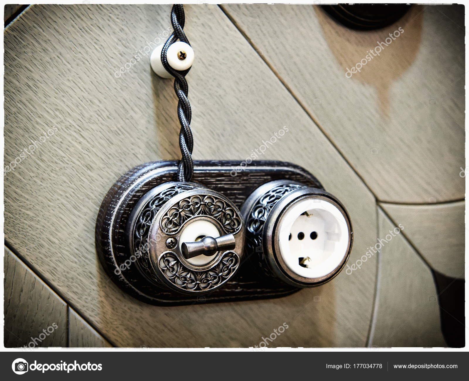 Retro light switch and socket Stock Photo by ©ryzhov 177034778