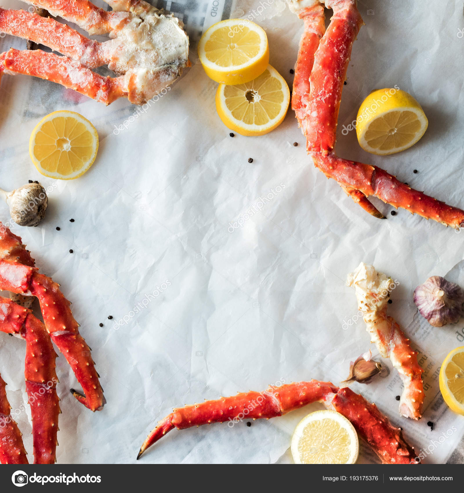 Top View Fresh Crab Legs Lemons Spices Crumpled Paper Stock Photo by ...