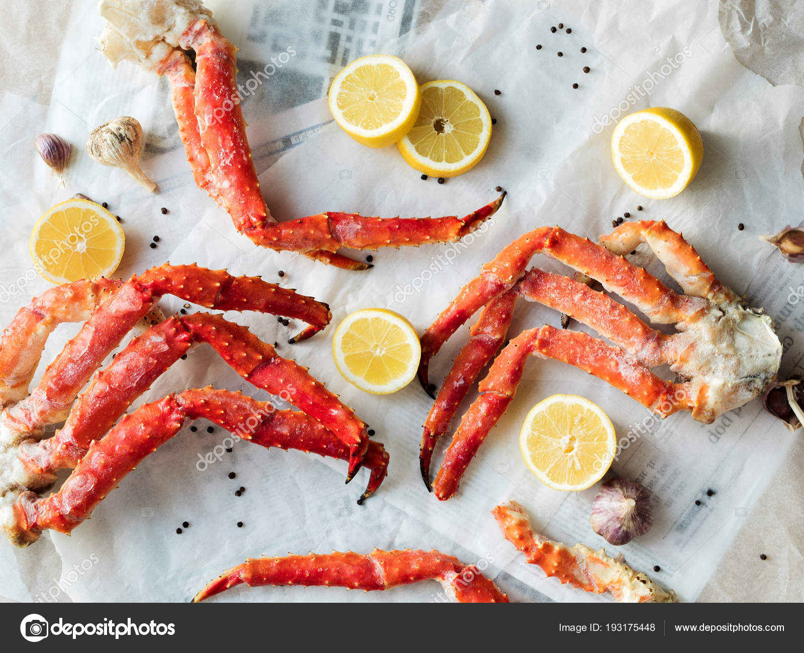 Top View Fresh Crab Legs Lemons Spices Paper Background Stock Photo by ...