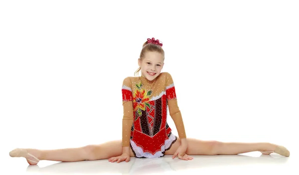 Girl gymnast doing the splits Stock Photo by ©lotosfoto1 79363554