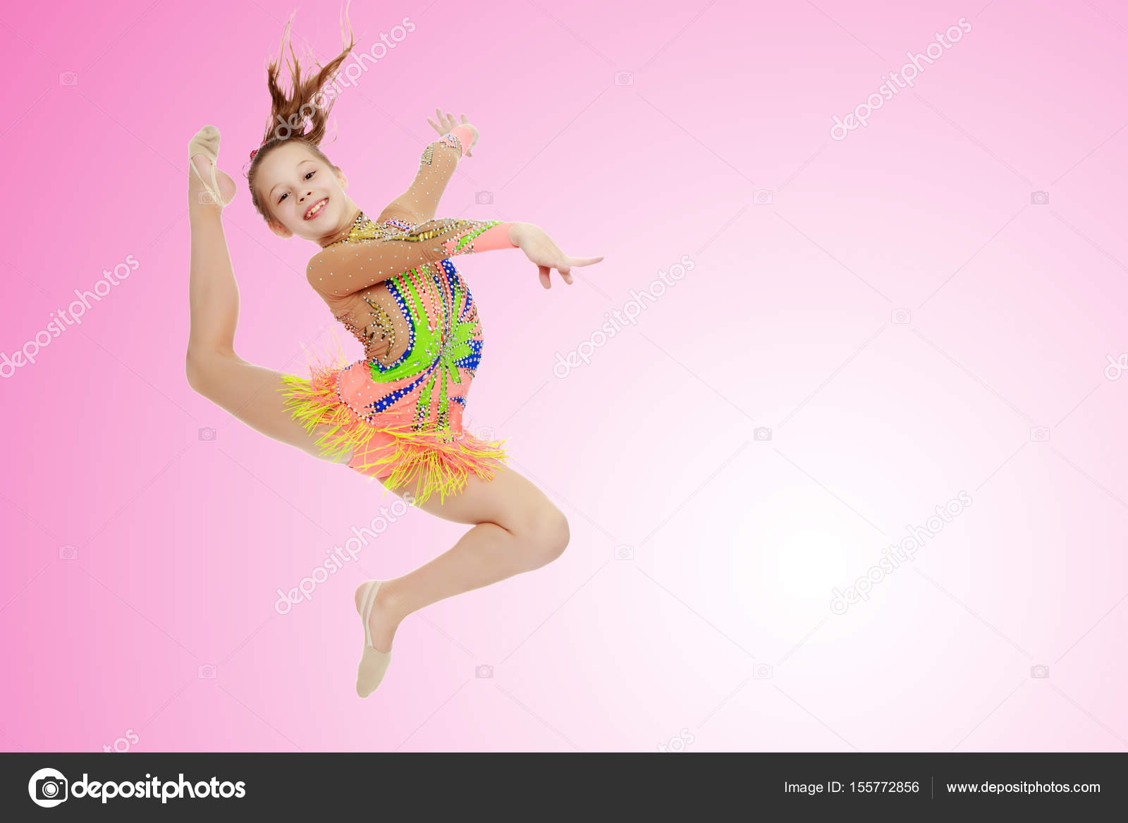 Girl gymnast performs a jump. — Stock Photo © lotosfoto1 #155772856