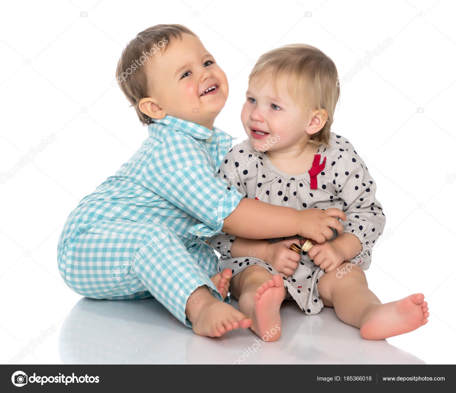 Babies boys and a girl cute embrace. — Stock Photo © lotosfoto1 #185366018