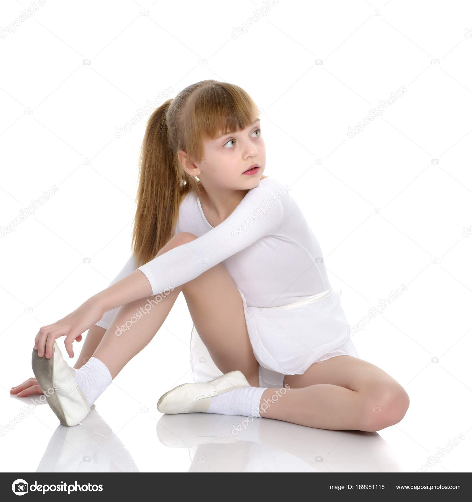 The gymnast perform an acrobatic element on the floor. — Stock Photo ...