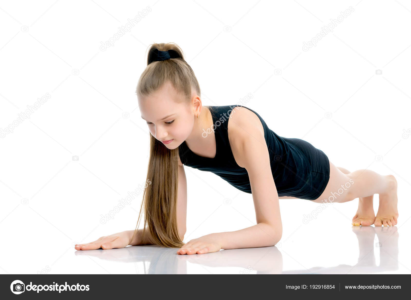 The gymnast perform an acrobatic element on the floor. Stock Photo by ...