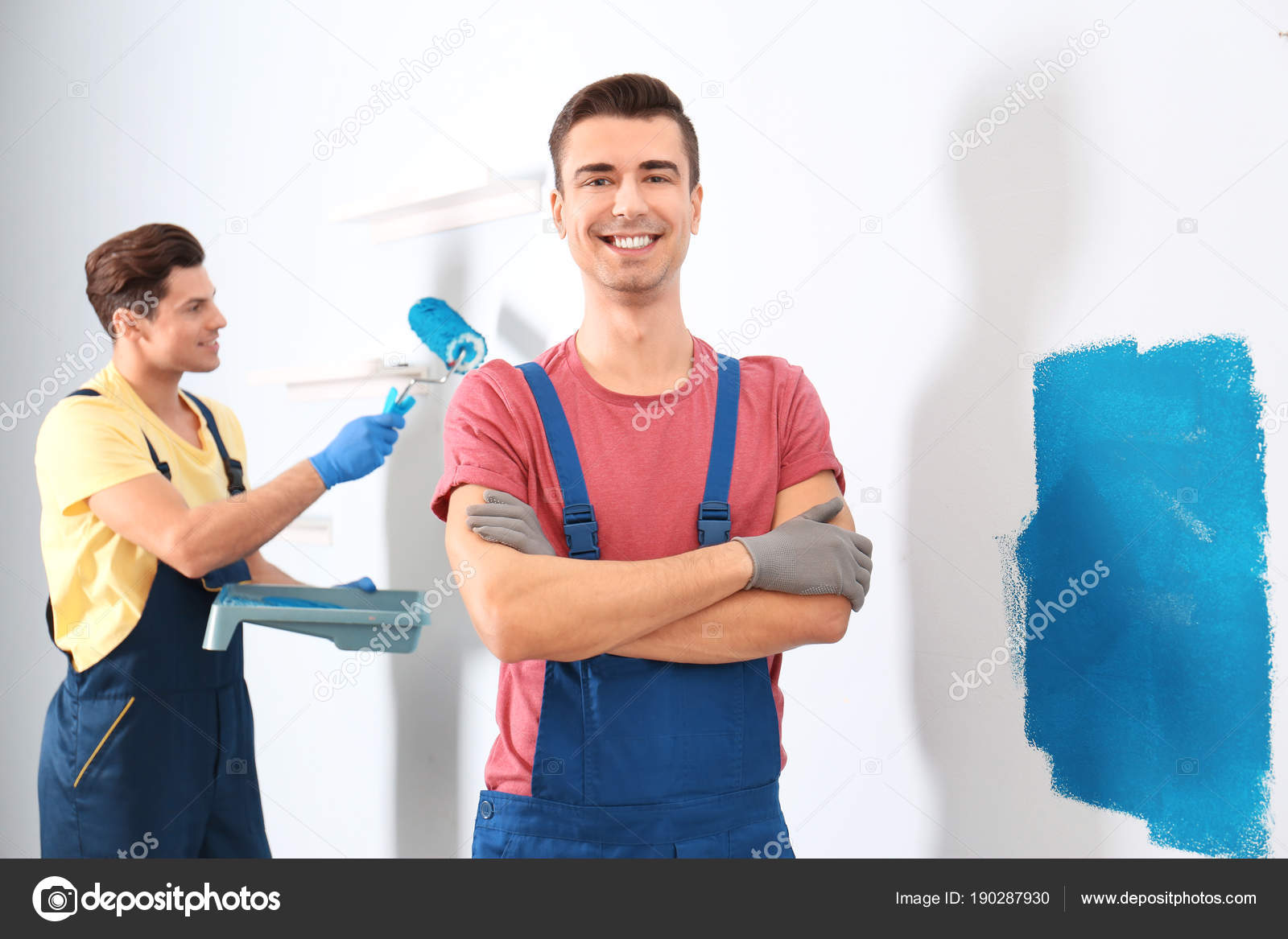 Professional decorators in uniforms indoors — Stock Photo © NewAfrica ...