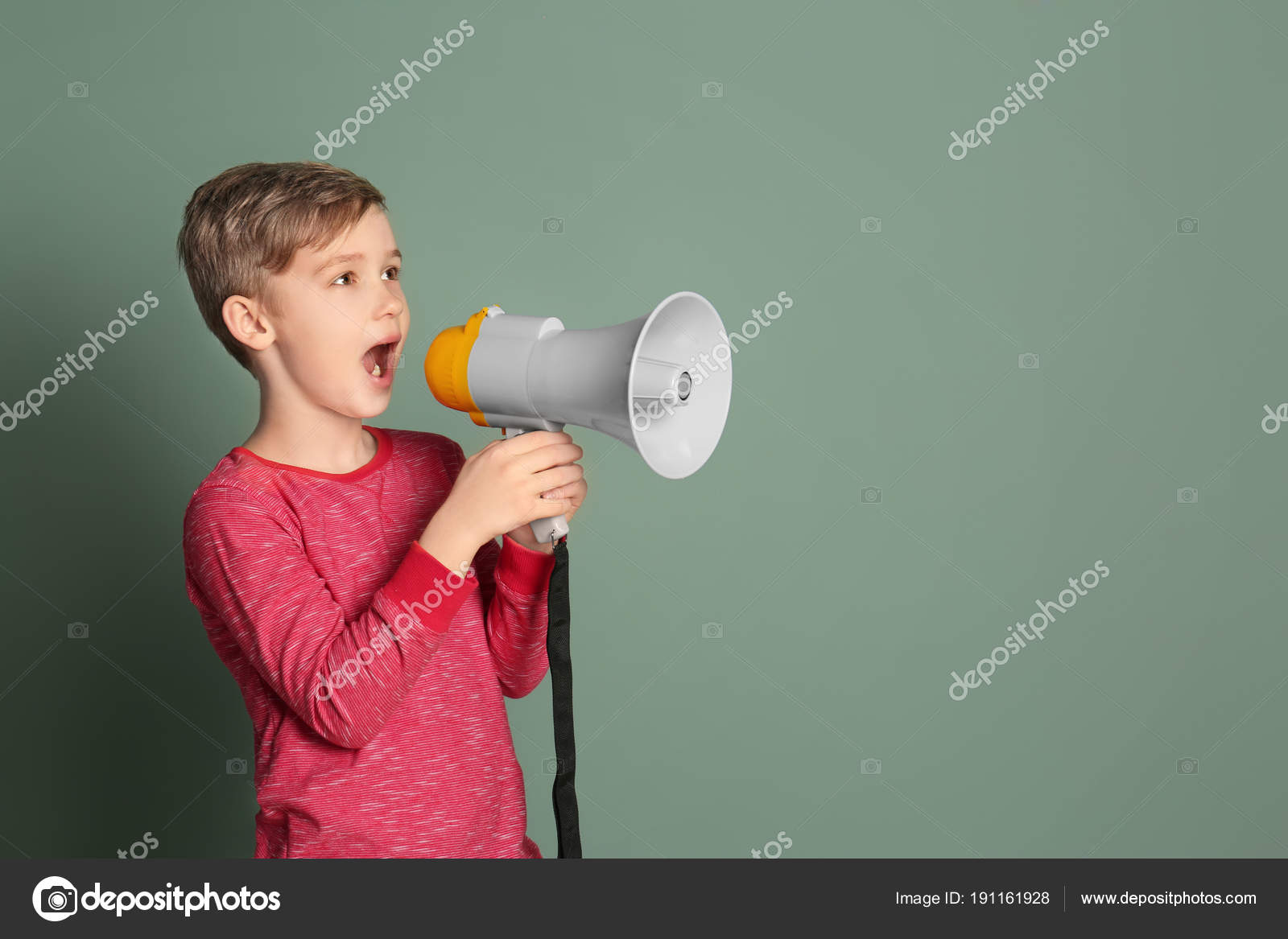 Cute little boy with megaphone on color background Stock Photo by ...