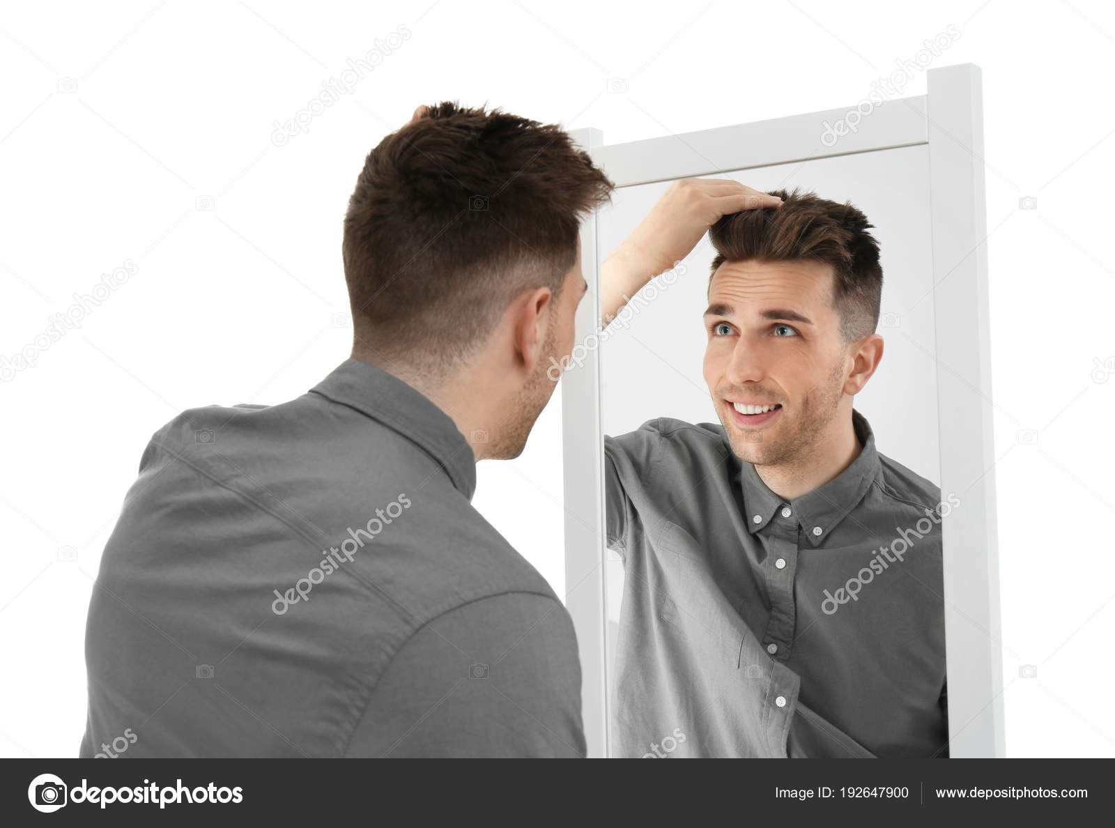Business Person Looking In Mirror