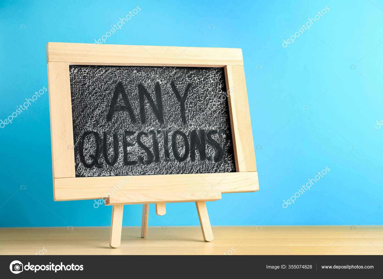 Blackboard Phrase Any Questions Wooden Table Blue Background — Stock ...