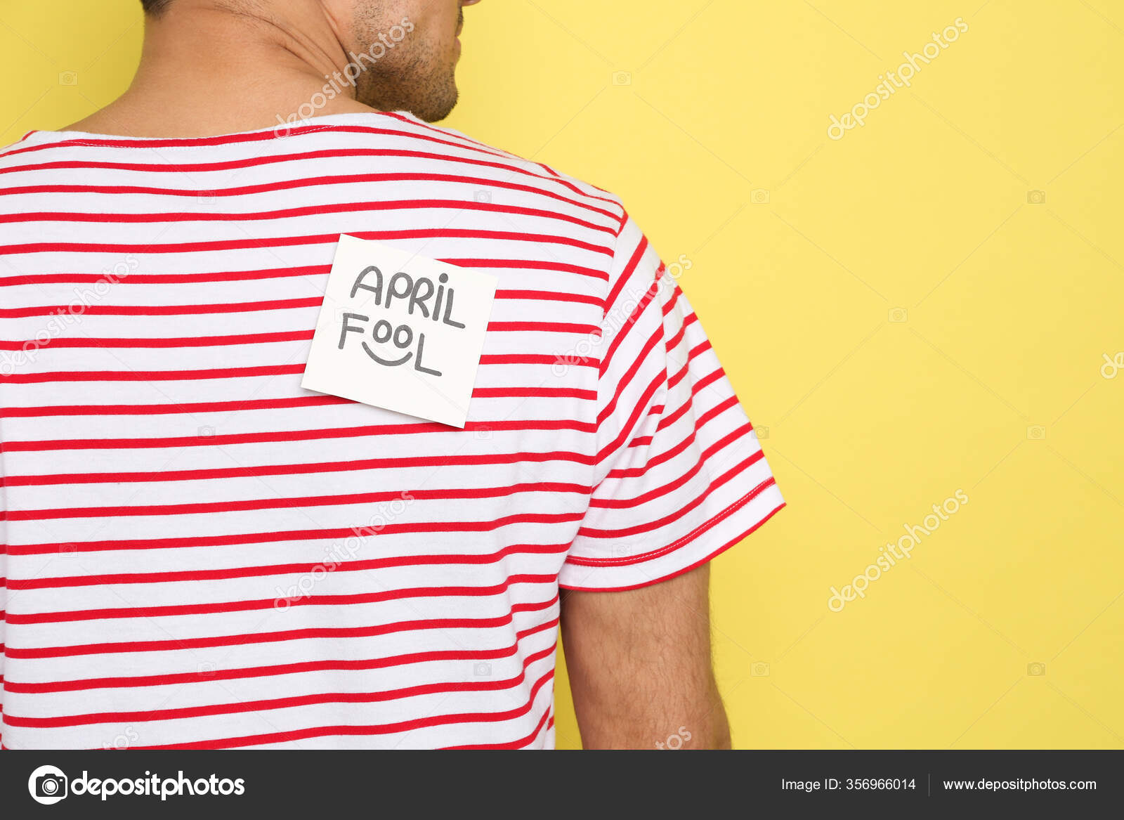 Man April Fool Sticker Back Yellow Background Closeup Stock Photo by ...