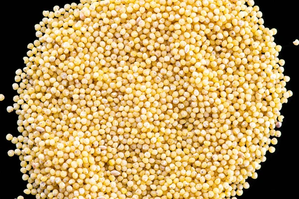 millet round yellow seeds on a white background - Stock Image - Everypixel