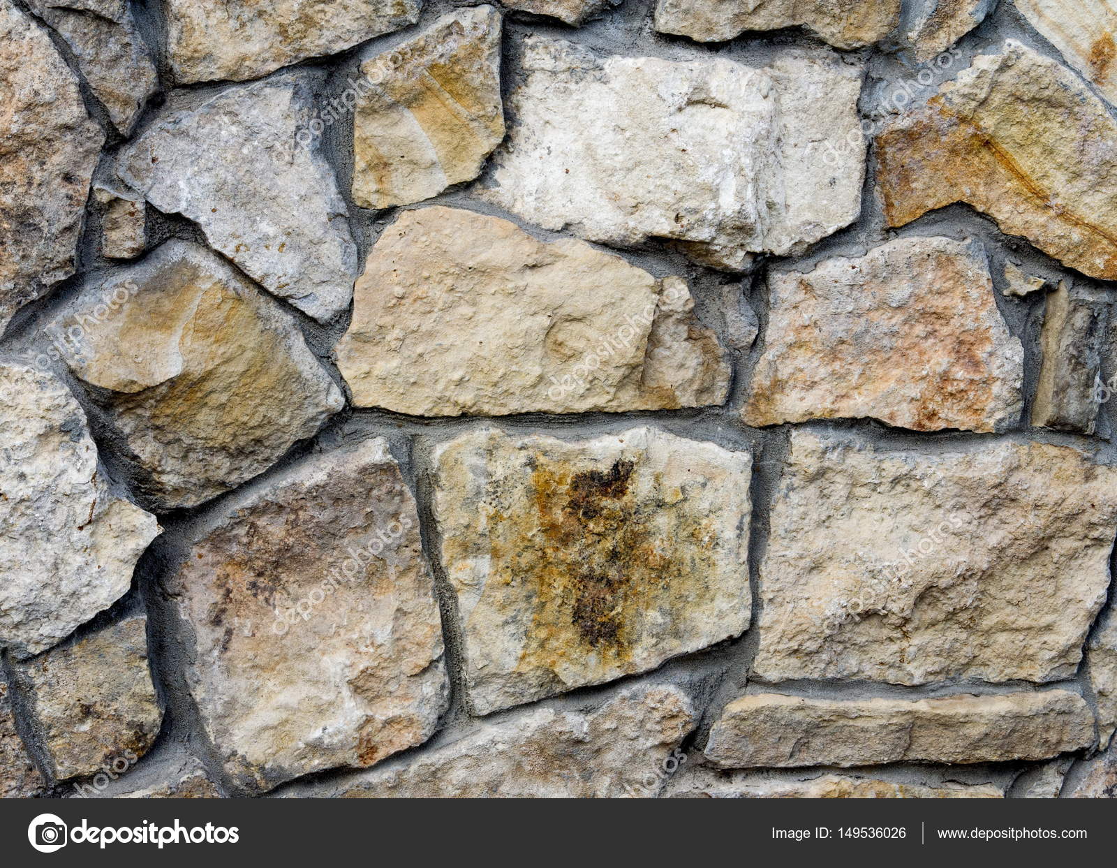 Texture, background. Fence lined with wild stone, granite, sands Stock ...