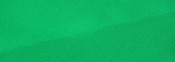 Texture, silk fabric of green color, solid light green silk sati ...