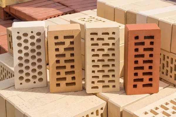 Perforated bricks of different colors with rectangular holes — Stock ...