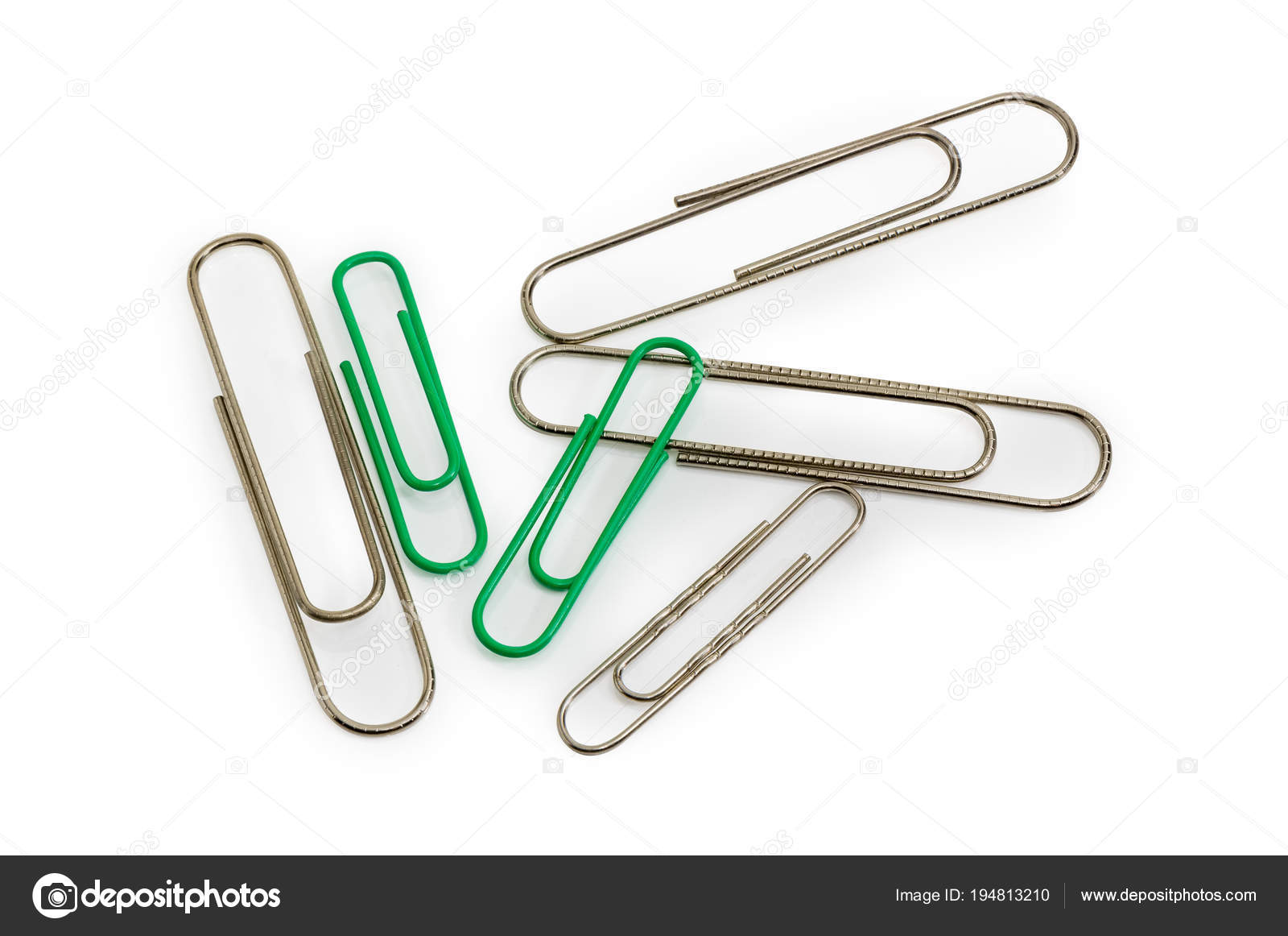 Paper clips different colors and sizes on a white background — Stock ...