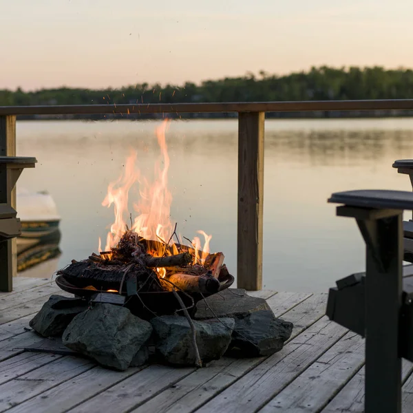 Campfire on lake Stock Photos, Royalty Free Campfire on lake Images ...
