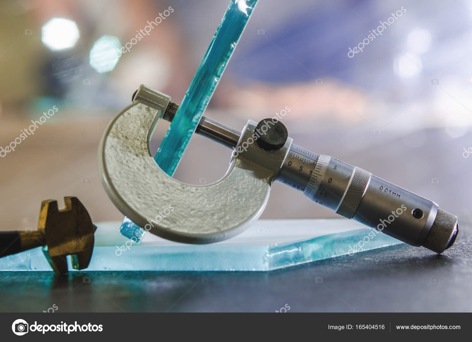Micrometer measures the thickness of the glass Stock Photo by ...