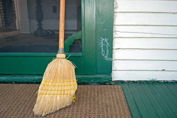 Old broom with hobo sign Stock Photo by ©jentara 61526057