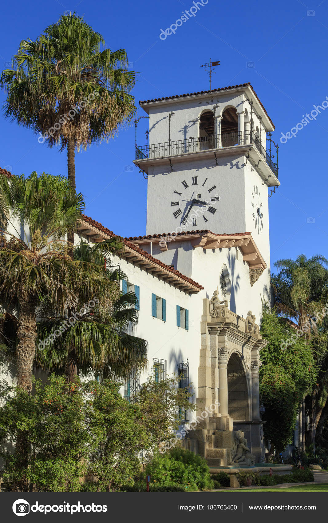 Courthouse clock tower Stock Photo by ©mwalla 186763400