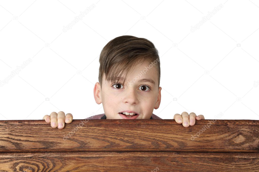 Boy look over fence Stock Photo by ©choocha69 127363110