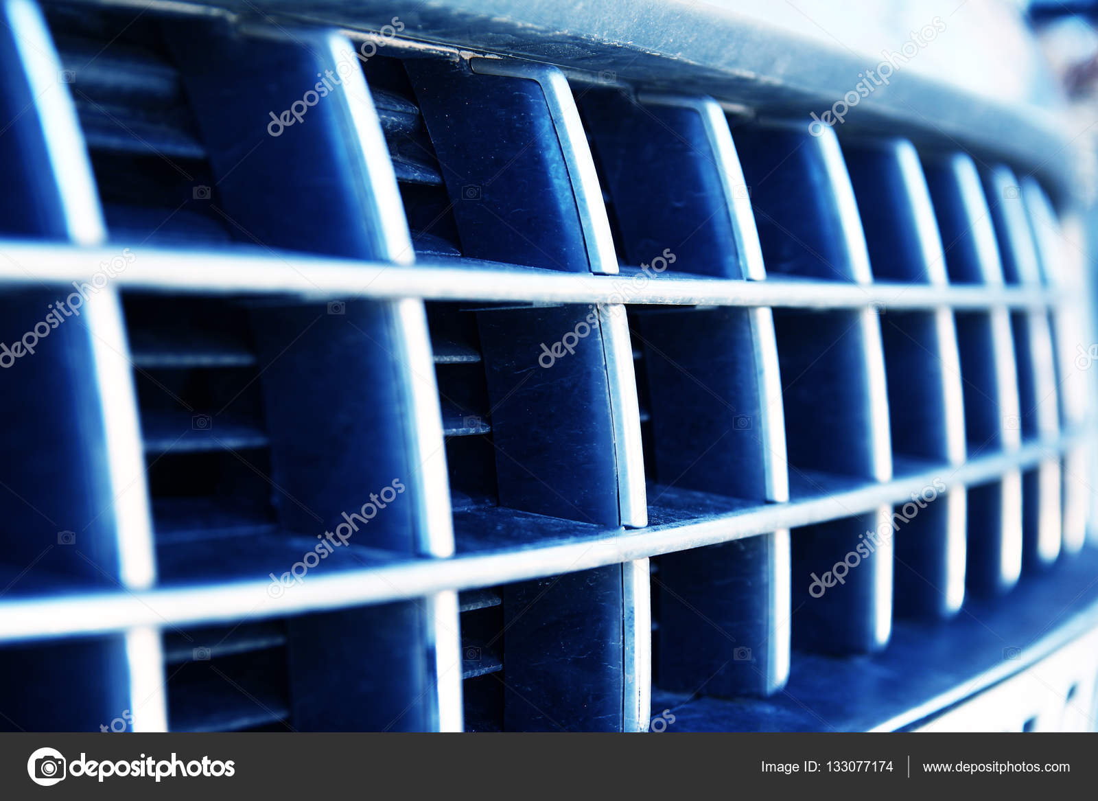 Mesh front bumper of car — Stock Photo © Kostia777 #133077174