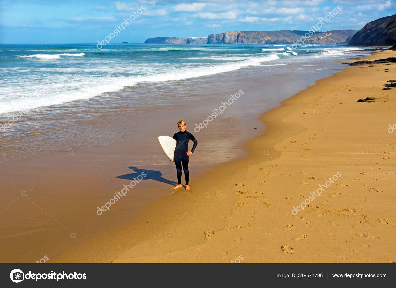 Aerial from a young guy going to surf at the atlantic ocean Stock Photo ...