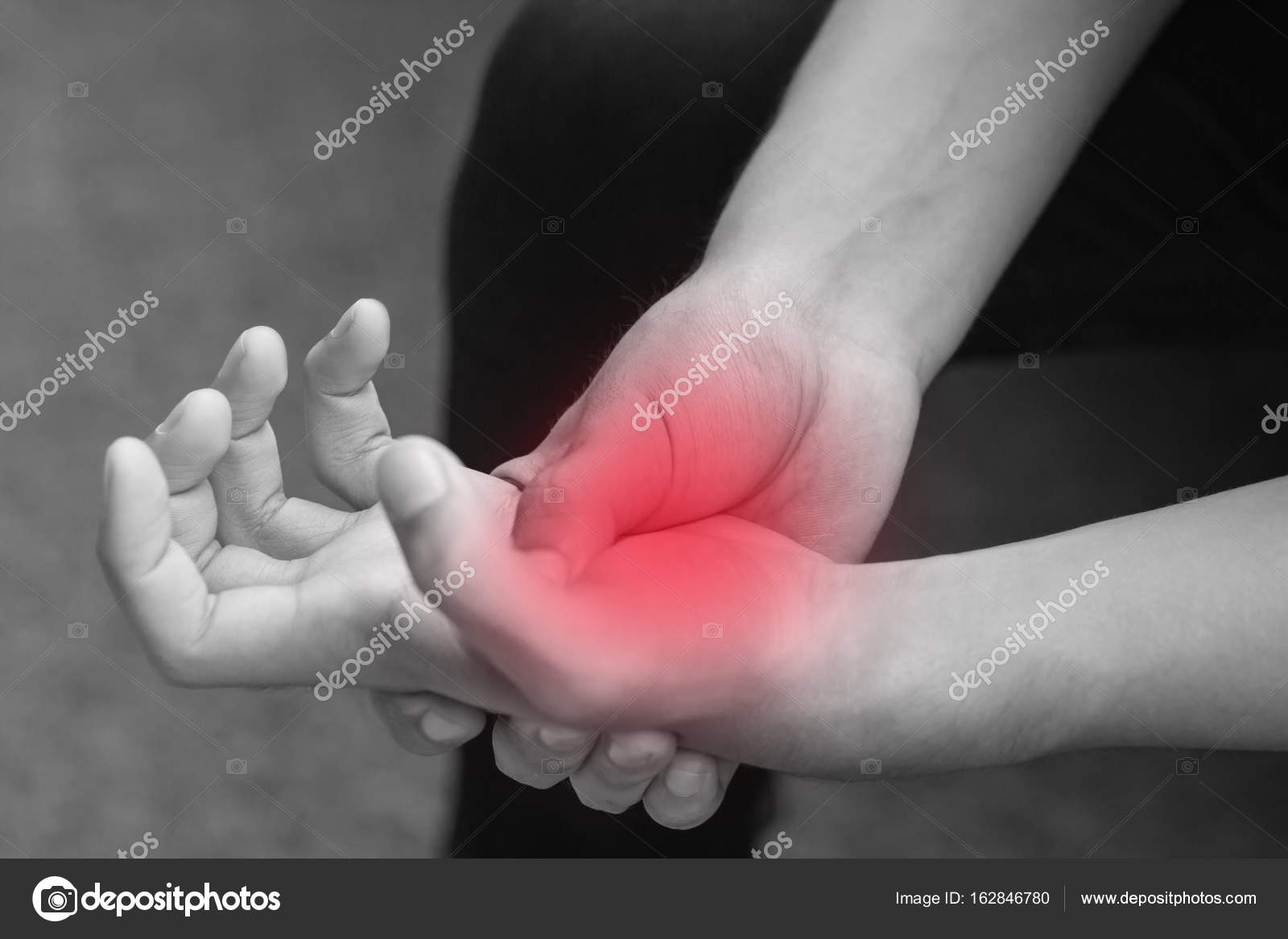 Man suffering from trigger finger, arthritis, wrist pain Stock Photo by ...
