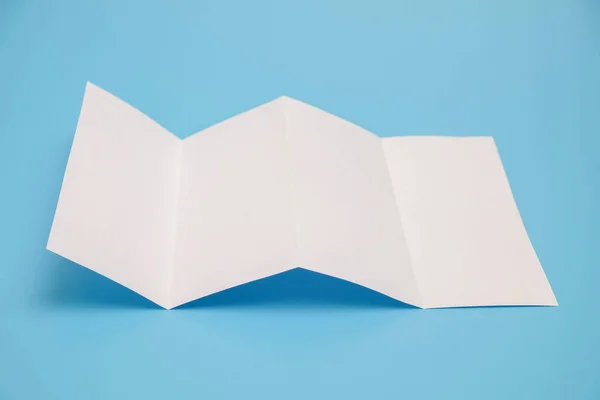 Template fold white paper on blue background Stock Photo by ©nattapol ...