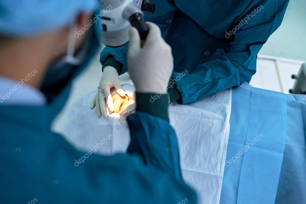 Surgery on eye, view form above — Stock Photo © DragonImages #128957280