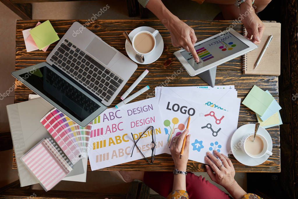 Businesswomen discussing design of website — Stock Photo © DragonImages ... Businesswomen discussing design of website — Stock Photo © DragonImages ...