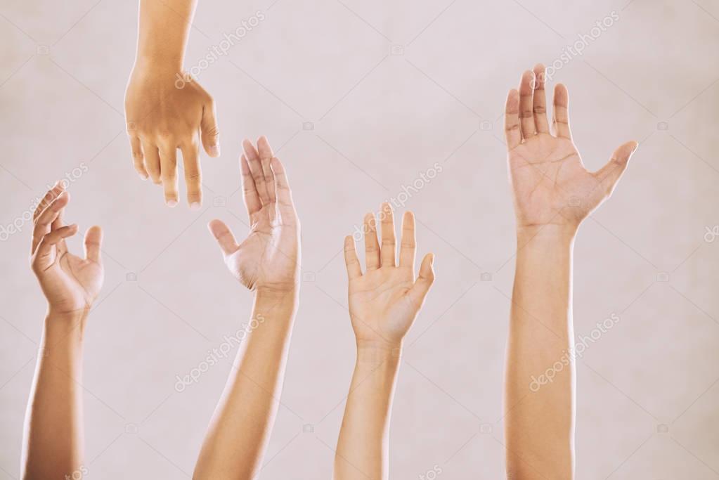 Hands of people reaching up for help Stock Photo by ©DragonImages 129210326